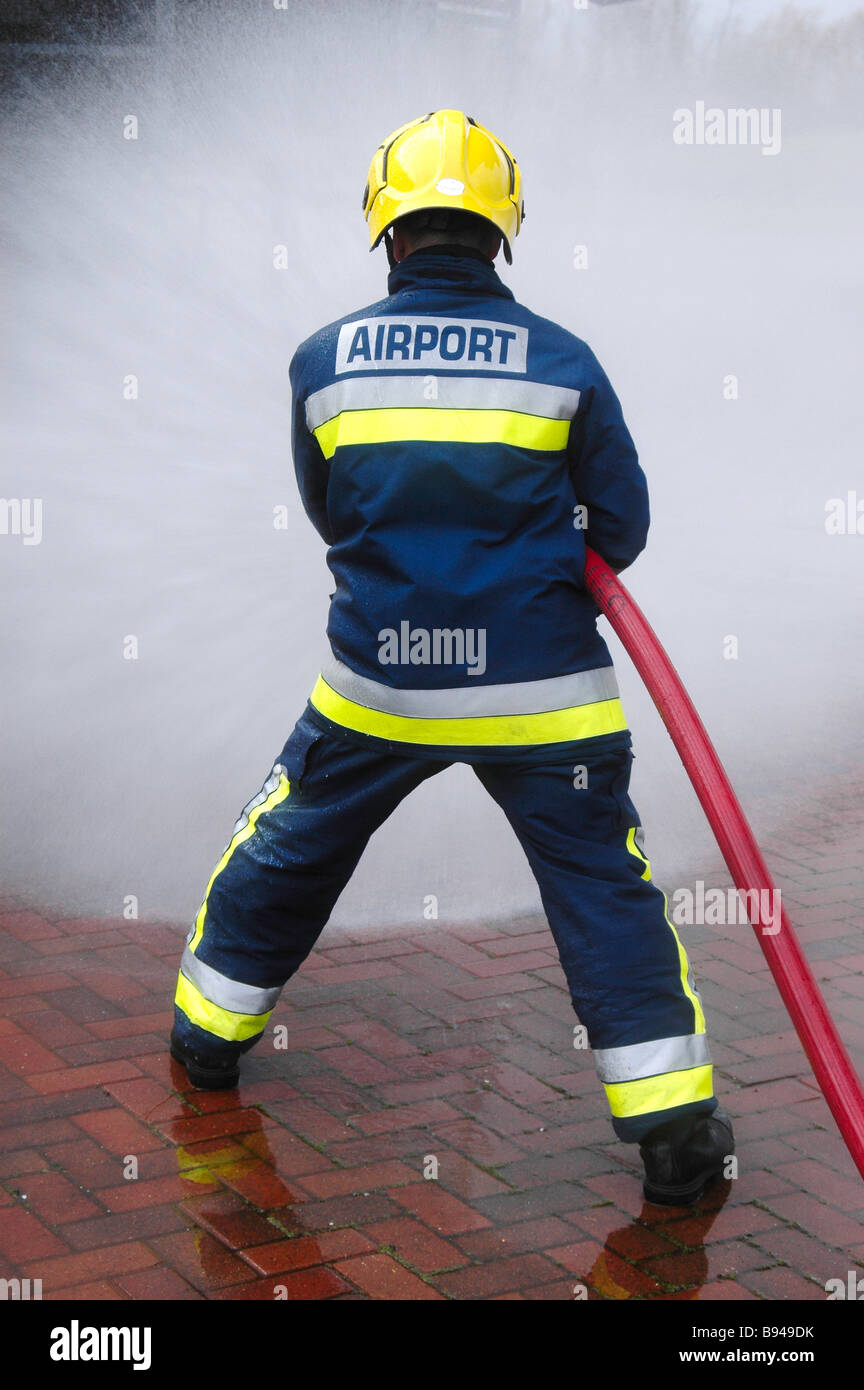 Firefighter fire behind hi-res stock photography and images - Alamy