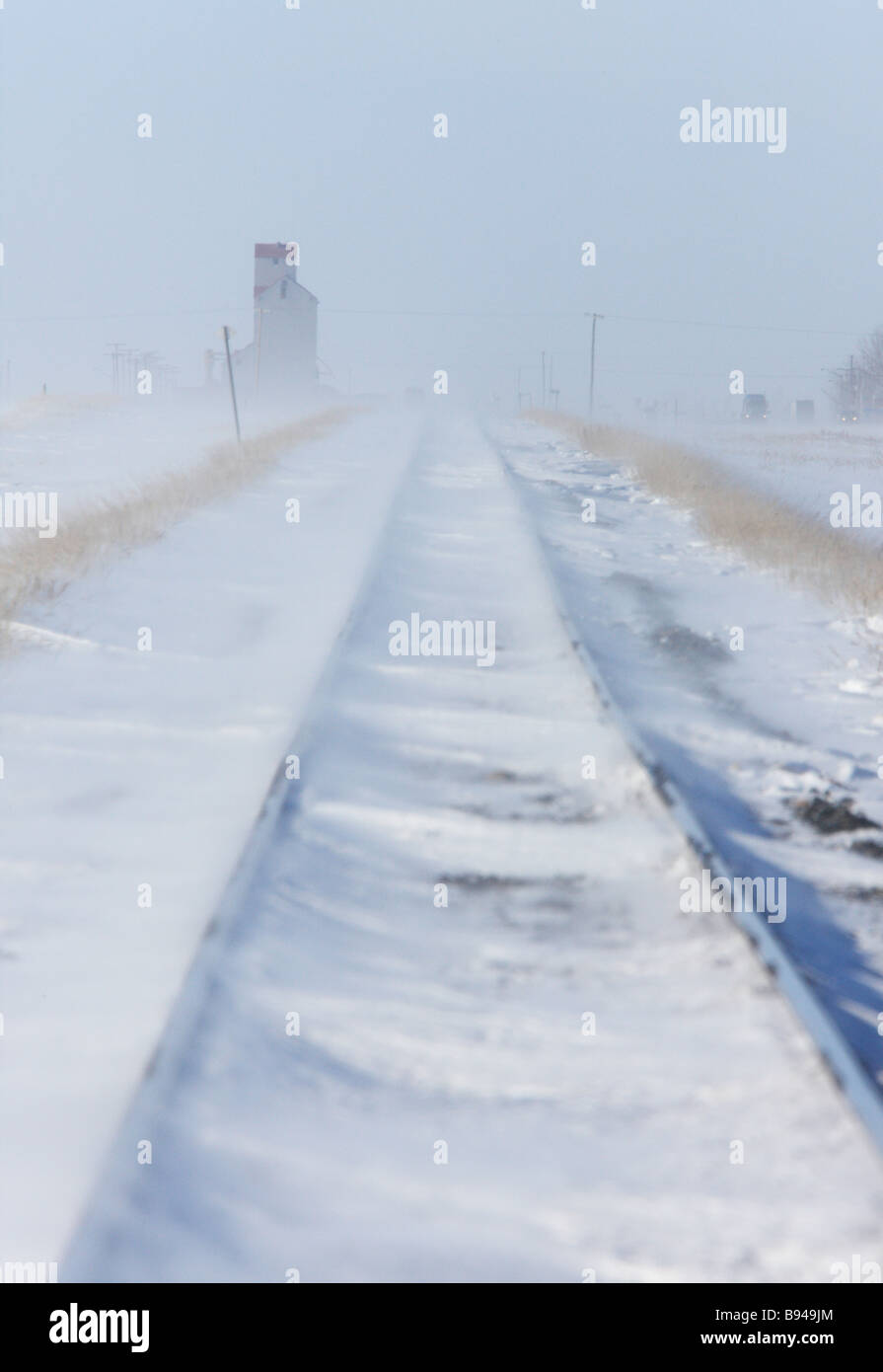 Train Tracks and Grain Elevator in Blizzard Saskatchewan Stock Photo ...