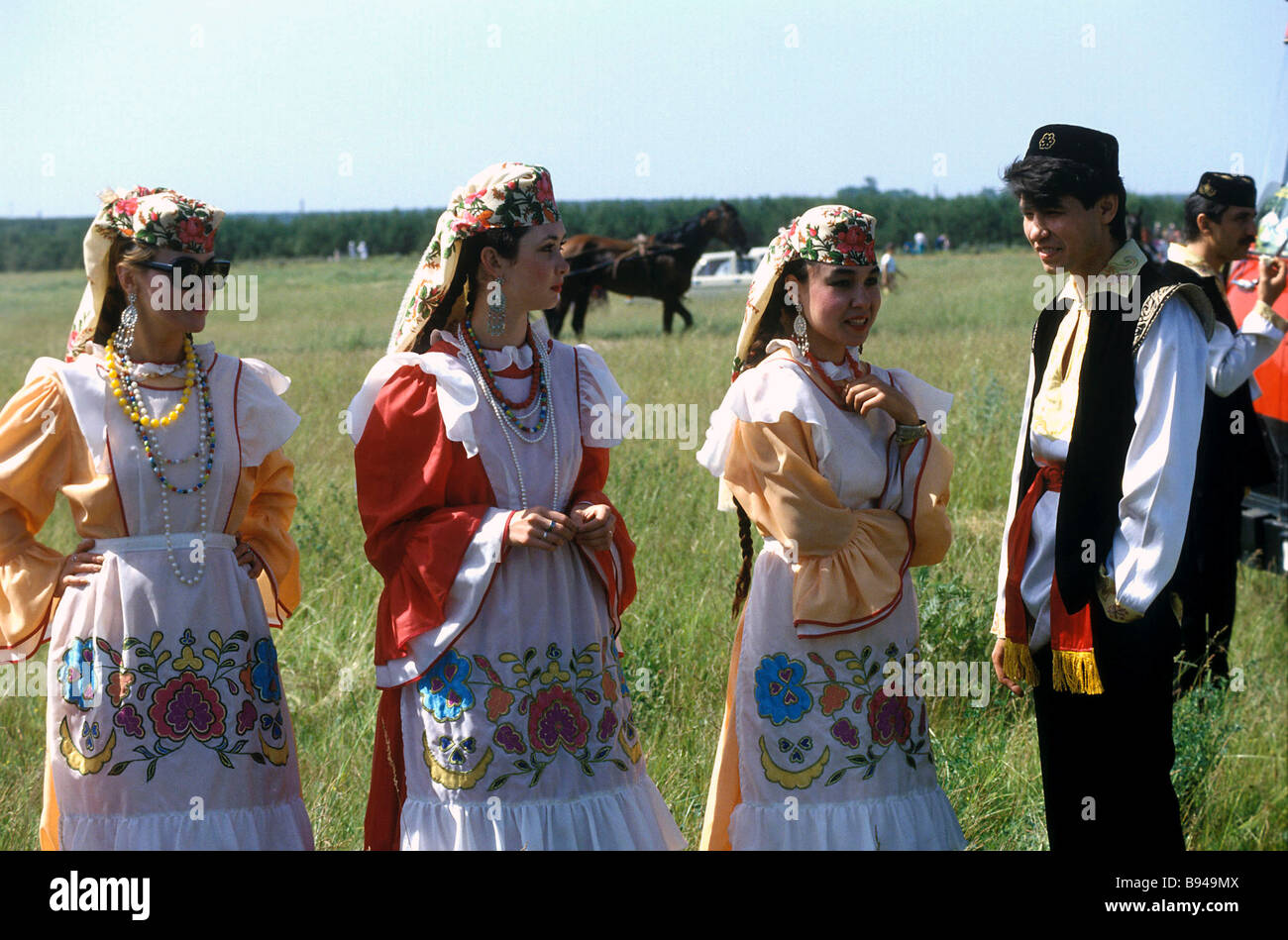 Young people wearing folk costumes for the Sabantui Tatar harvest ...