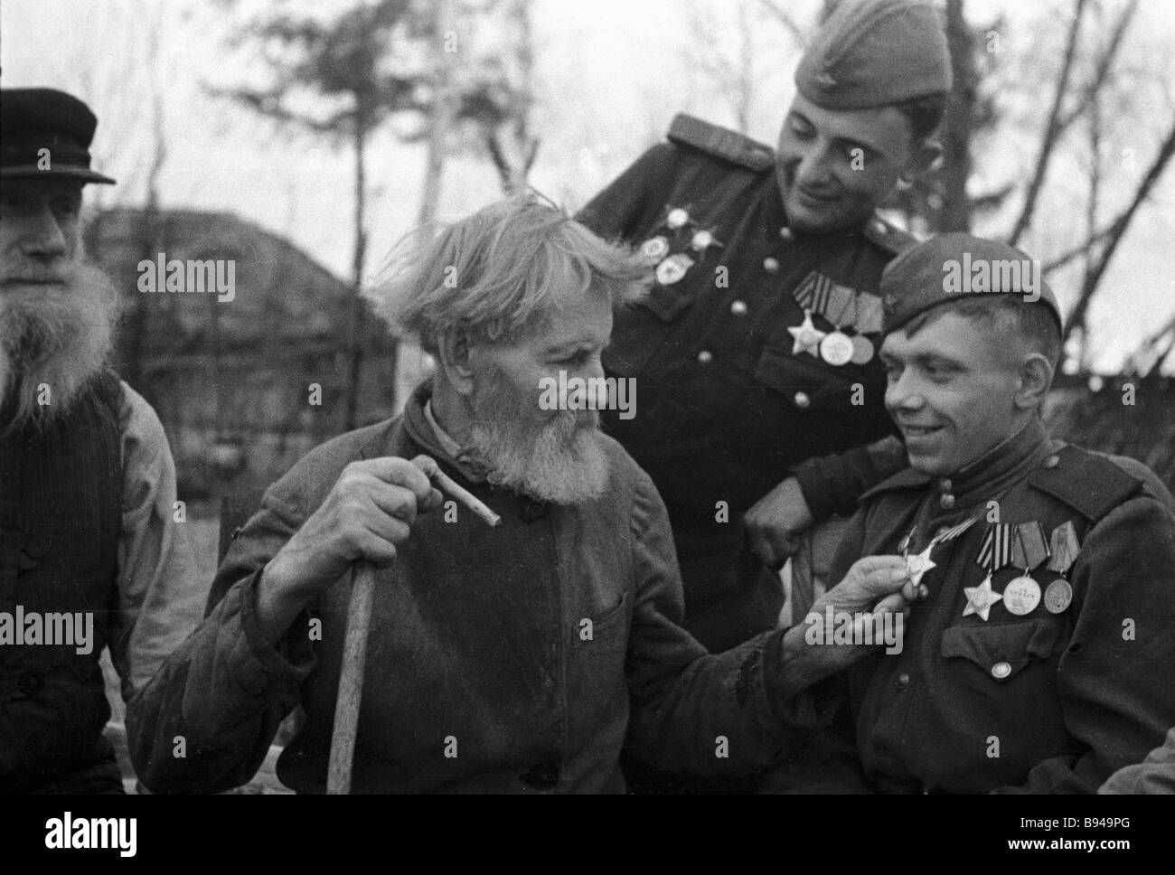 The Red Army men back in their native village from war Stock Photo - Alamy