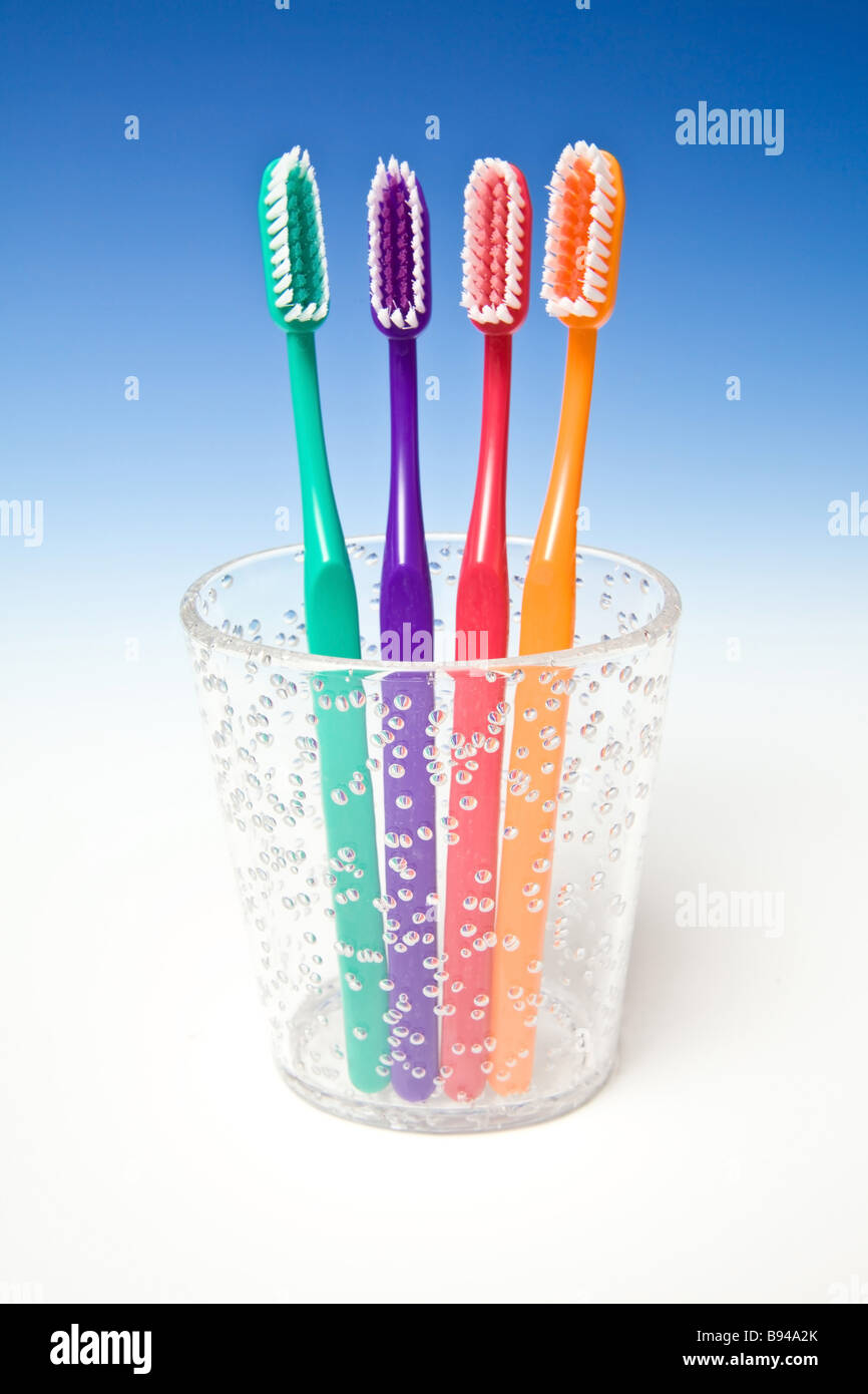 Coloured tooth brushes hi-res stock photography and images - Alamy
