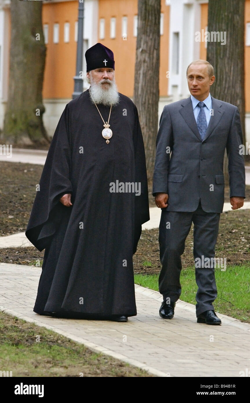 Russian President Vladimir Putin and Patriarch Alexius II of Moscow and ...