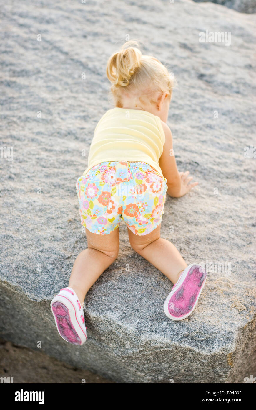 Child playing with rocks hi-res stock photography and images - Alamy