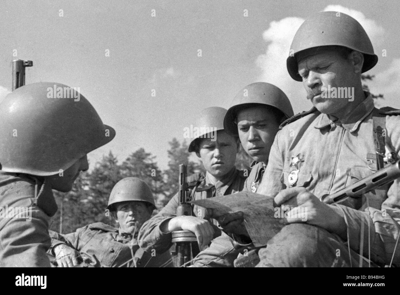 Leningrad Front soldier reading a letter from home Stock Photo - Alamy