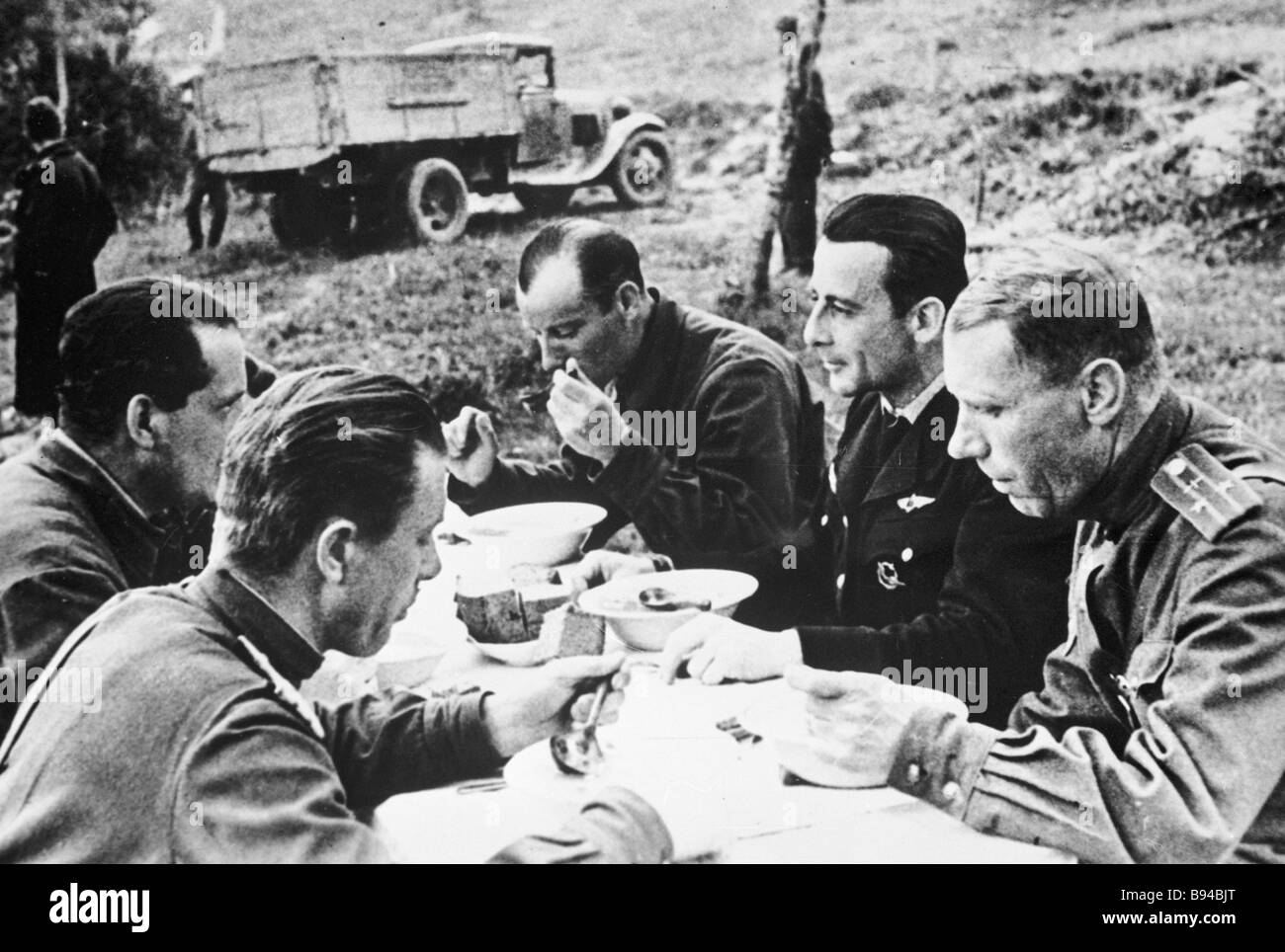 French pilots of the Normandie Niemen fighter squadron having a meal at ...