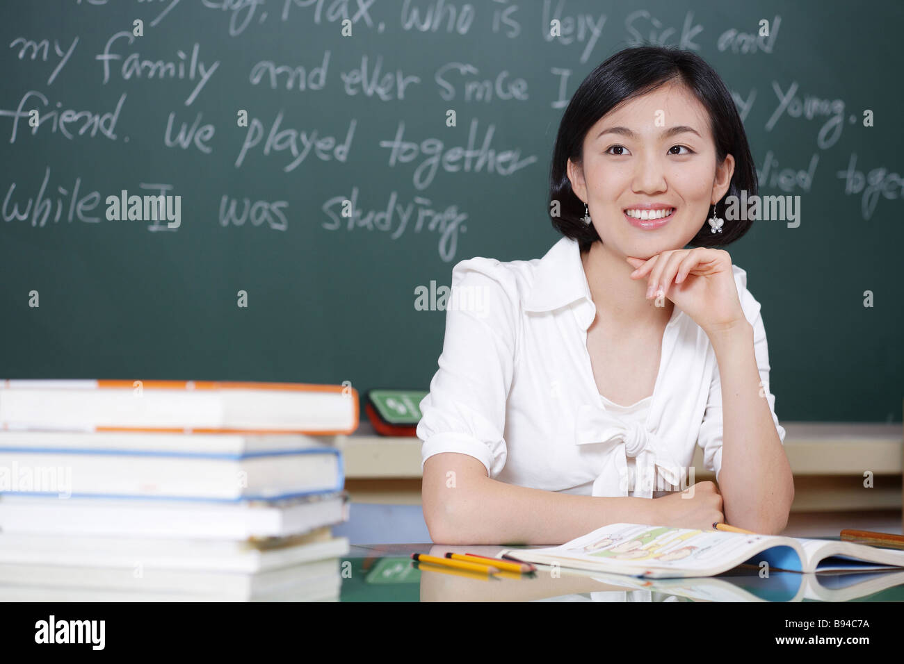 Miss Teacher in School Stock Photo - Alamy