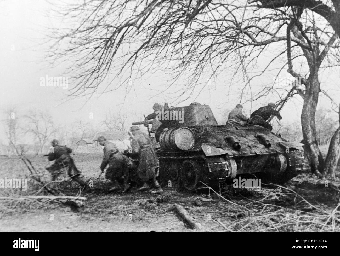 Soldiers jumping down from the armor the second world war Stock Photo ...