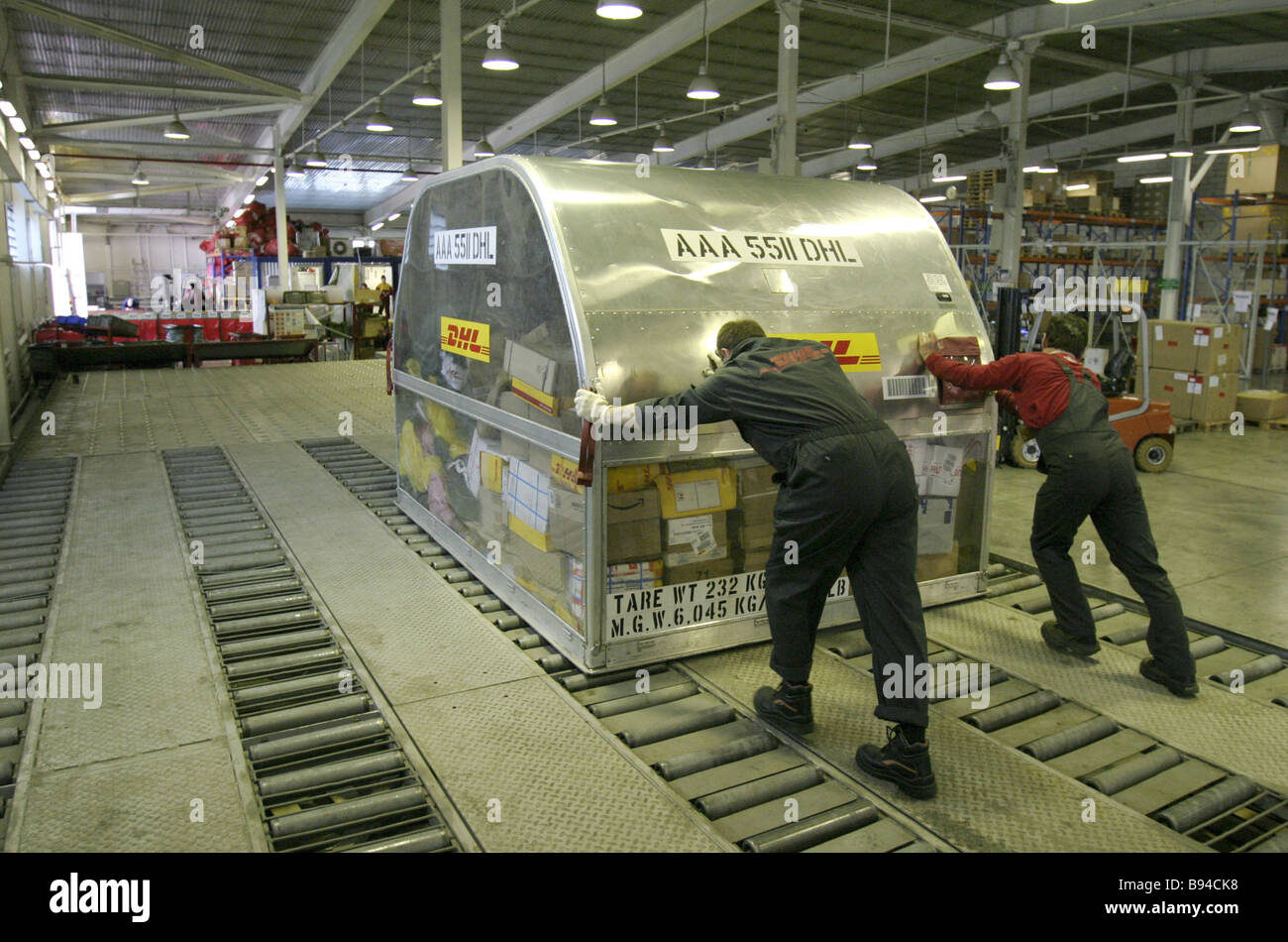 Unloading an air container in the DHL company s customs terminal at ...
