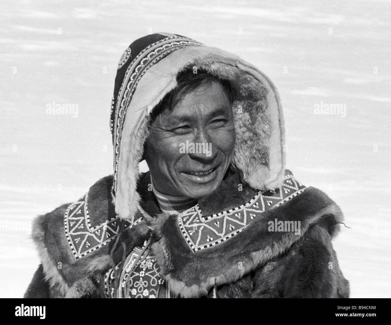 An Evenki hunter in a folk costune Stock Photo - Alamy