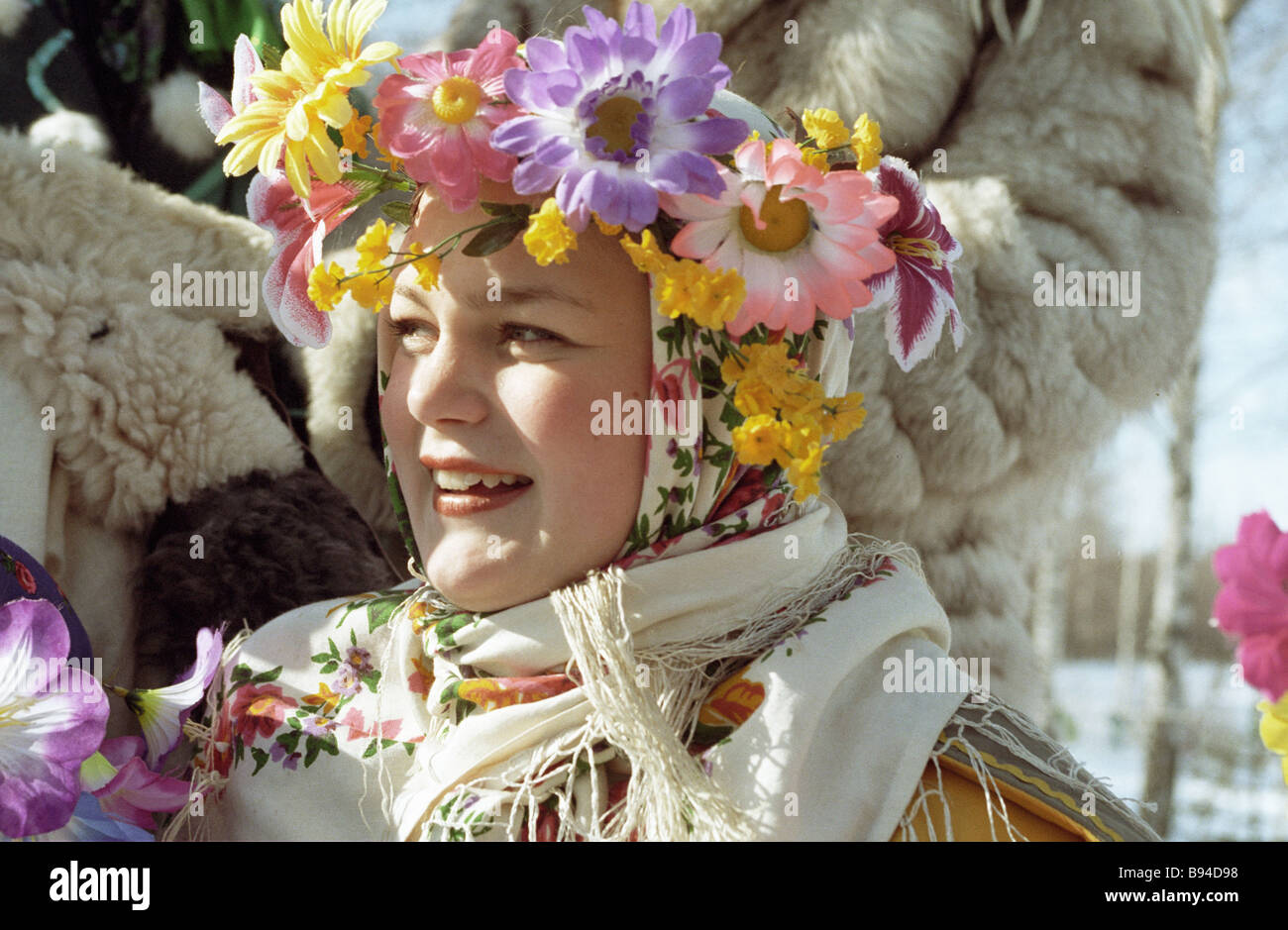 A girl in ethnic costume at spring festival Stock Photo - Alamy