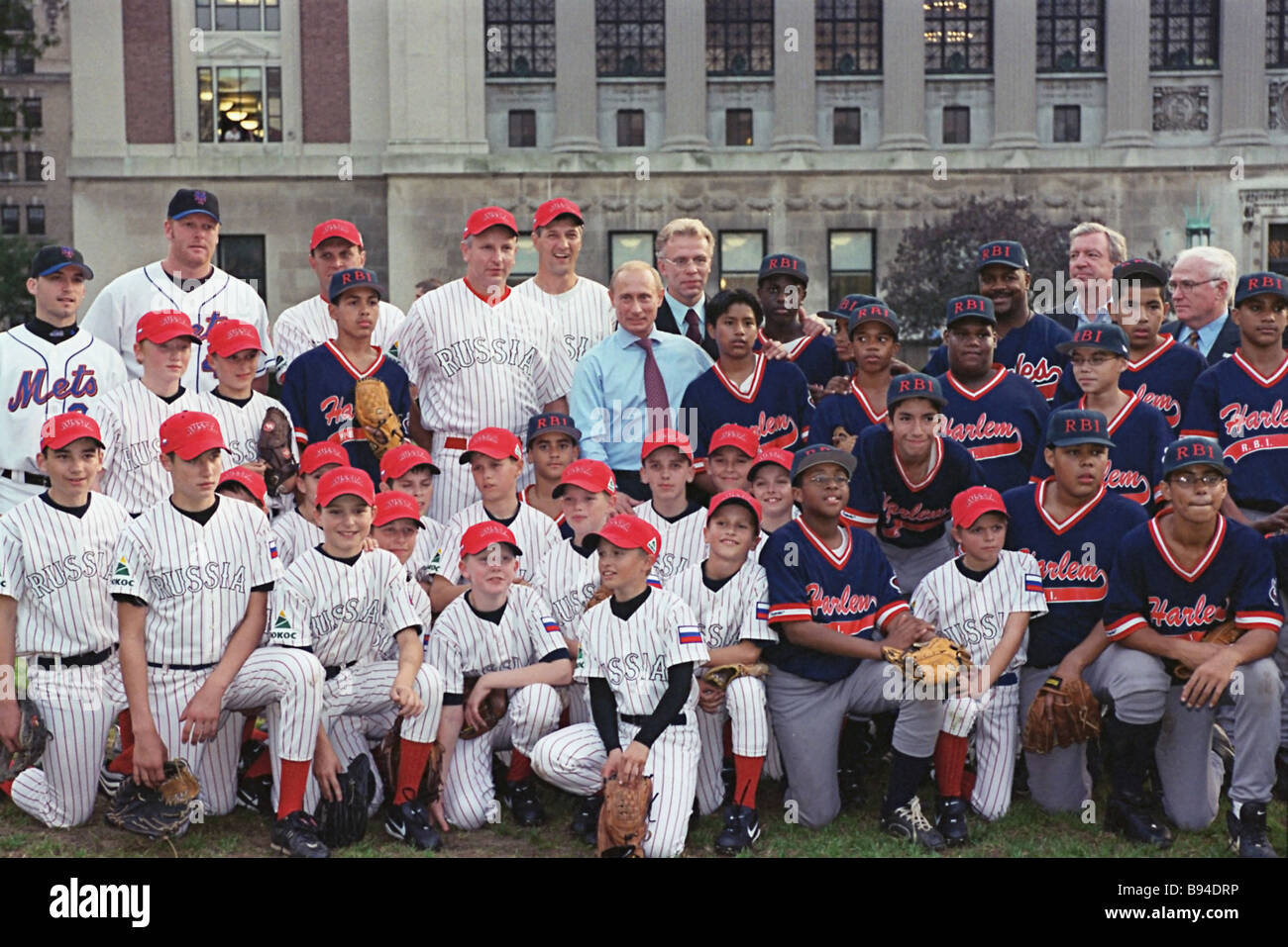 Russian President Vladimir Putin and players of Russian and American ...