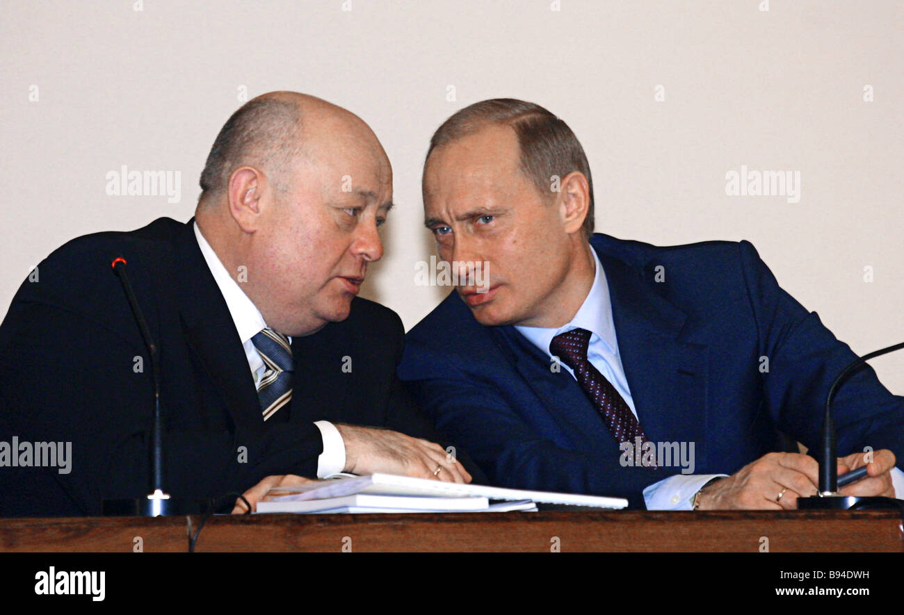 Russian President Vladimir Putin right and Prime Minister Mikhail ...