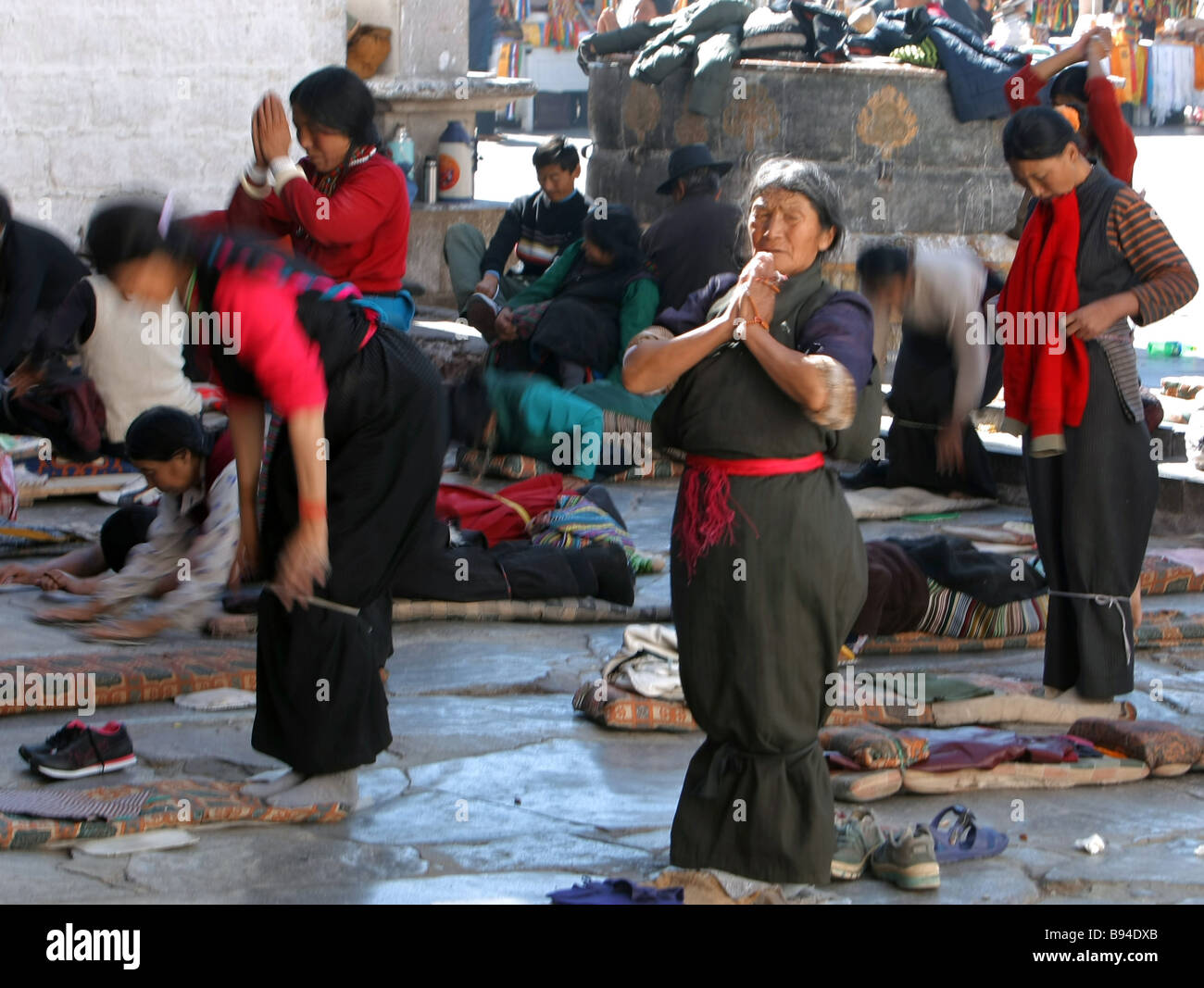 Pilgrims near the Jokhang Monastery in the center of Lhasa the capital ...