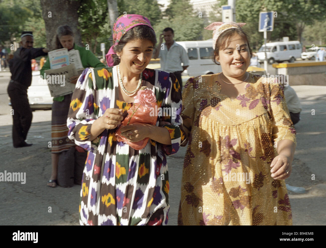 Girls walking along a Dushanbe street Stock Photo - Alamy