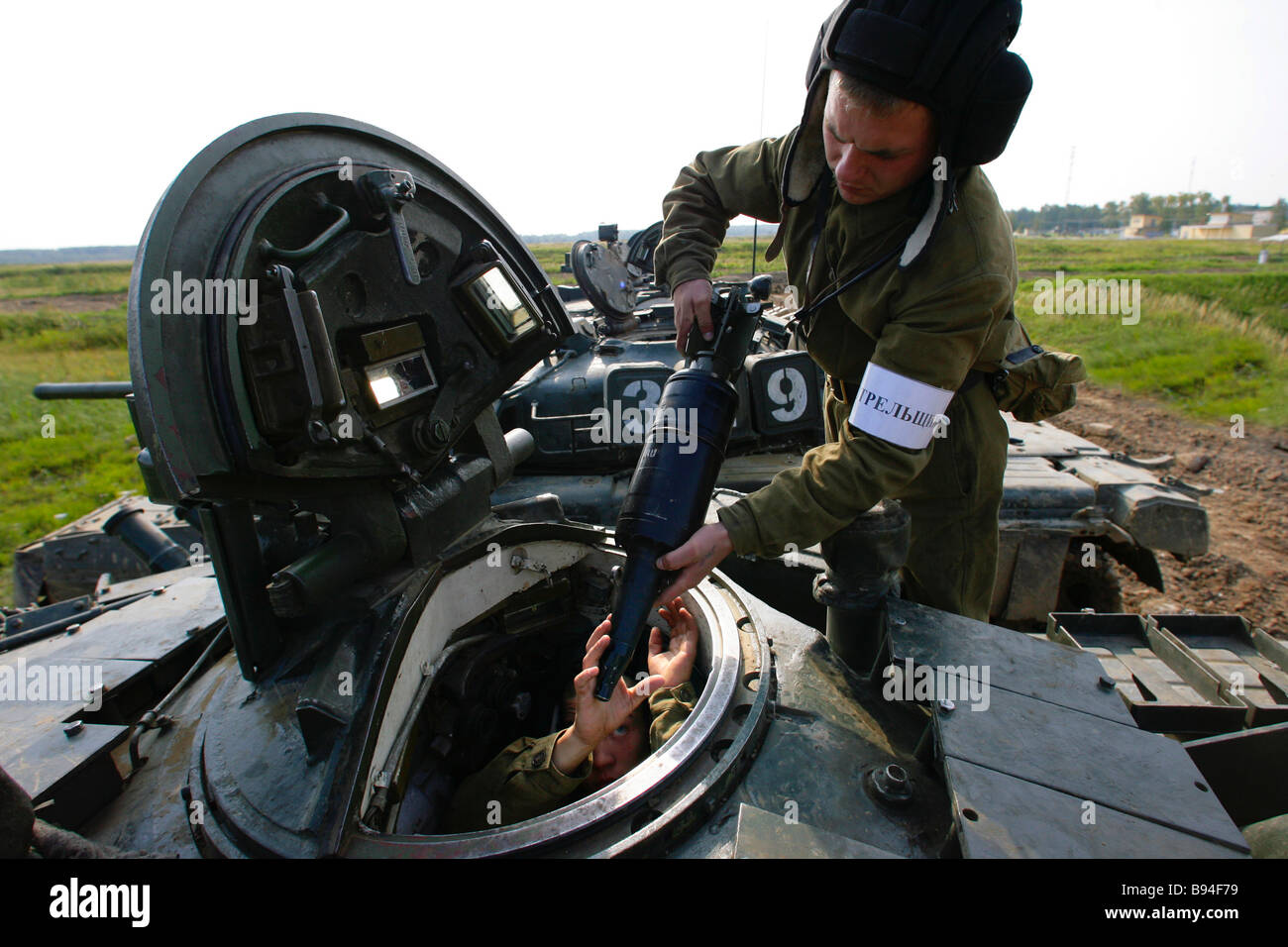 Loading shell into the cannon of the T 80U tank before military ...