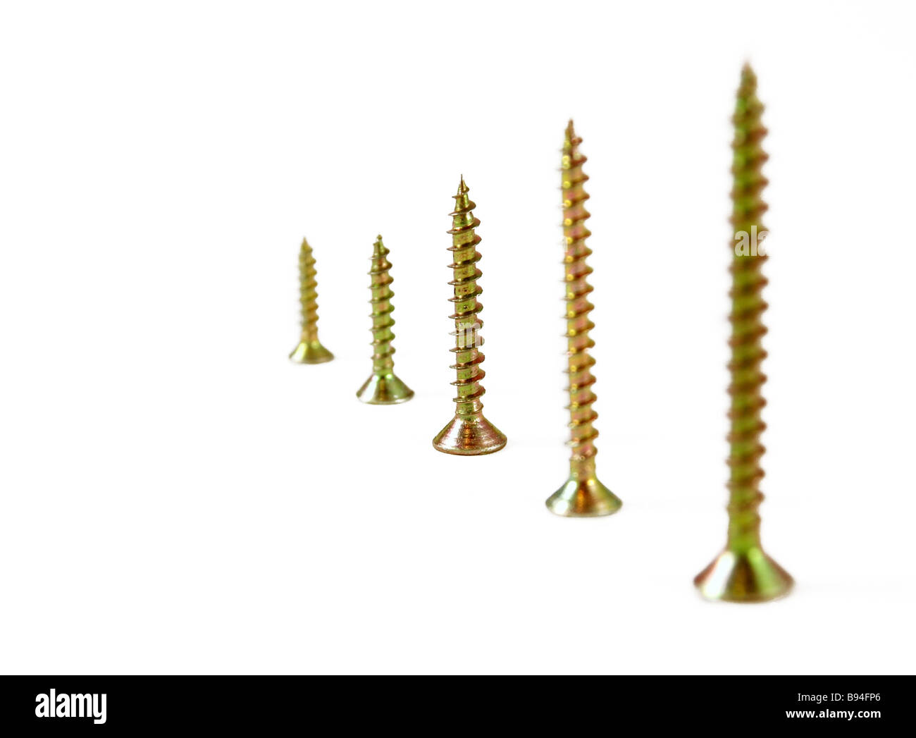 A line of receding screws Stock Photo - Alamy