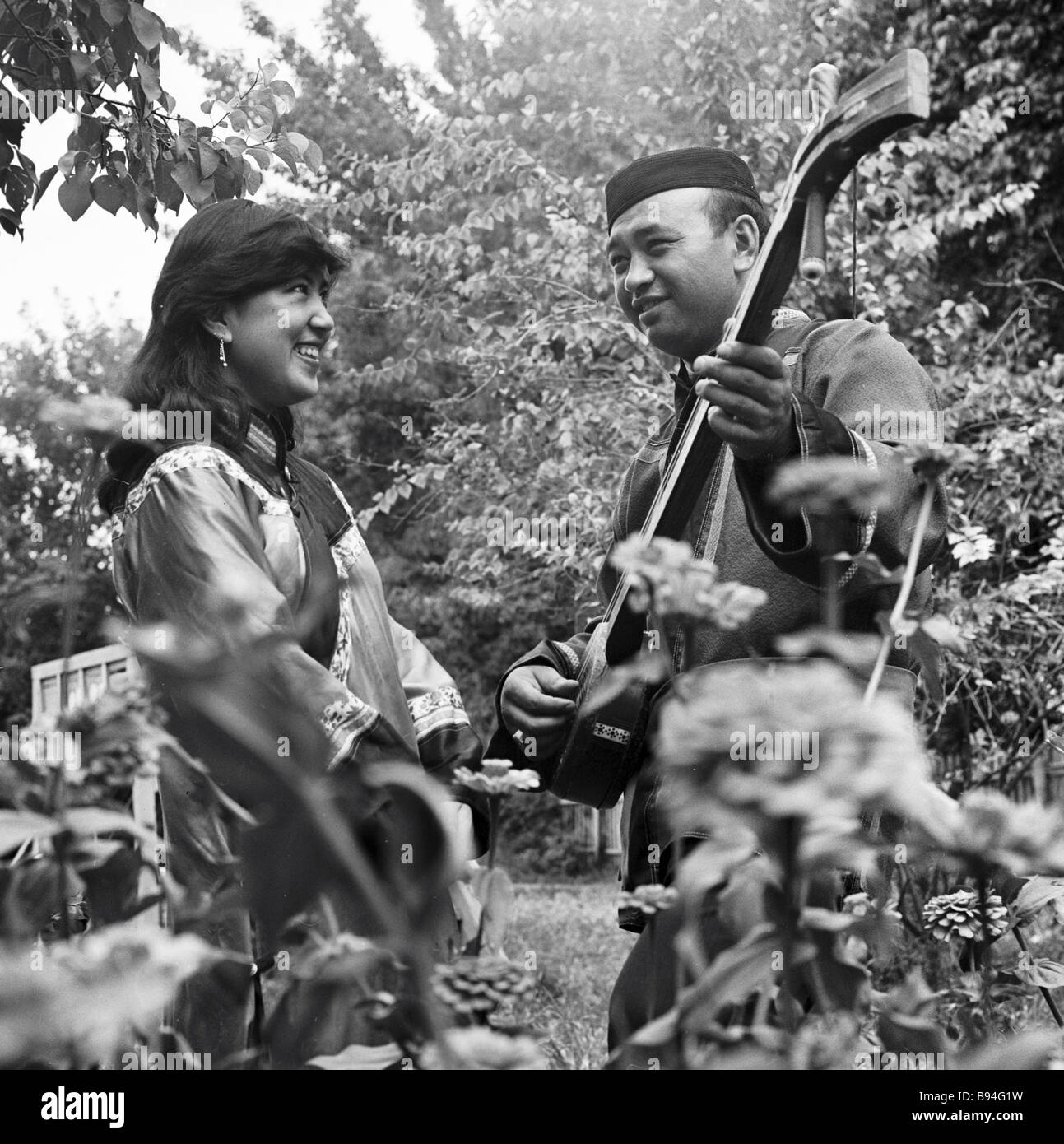 Young people in Dungan national clothes Stock Photo - Alamy