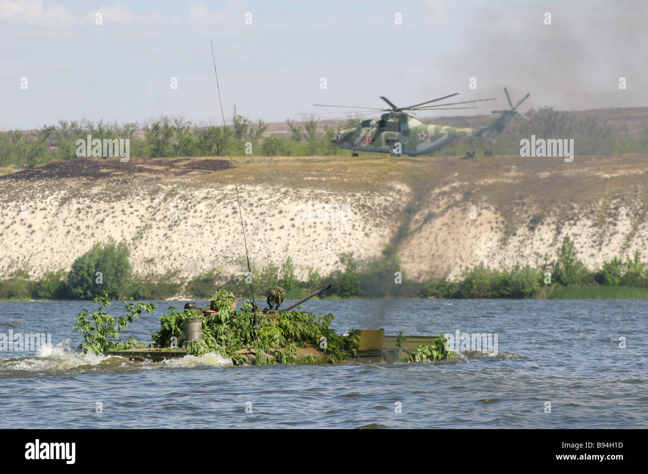 Water barriers crossing and helicopter assault force landing during war ...