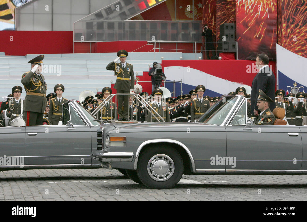 Russian Defense Minister Anatoly Serdyukov to the right and parade ...