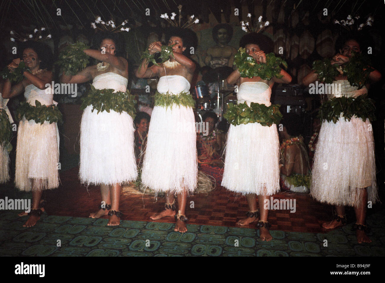 Women from Fiji island do a national meke dance Stock Photo - Alamy