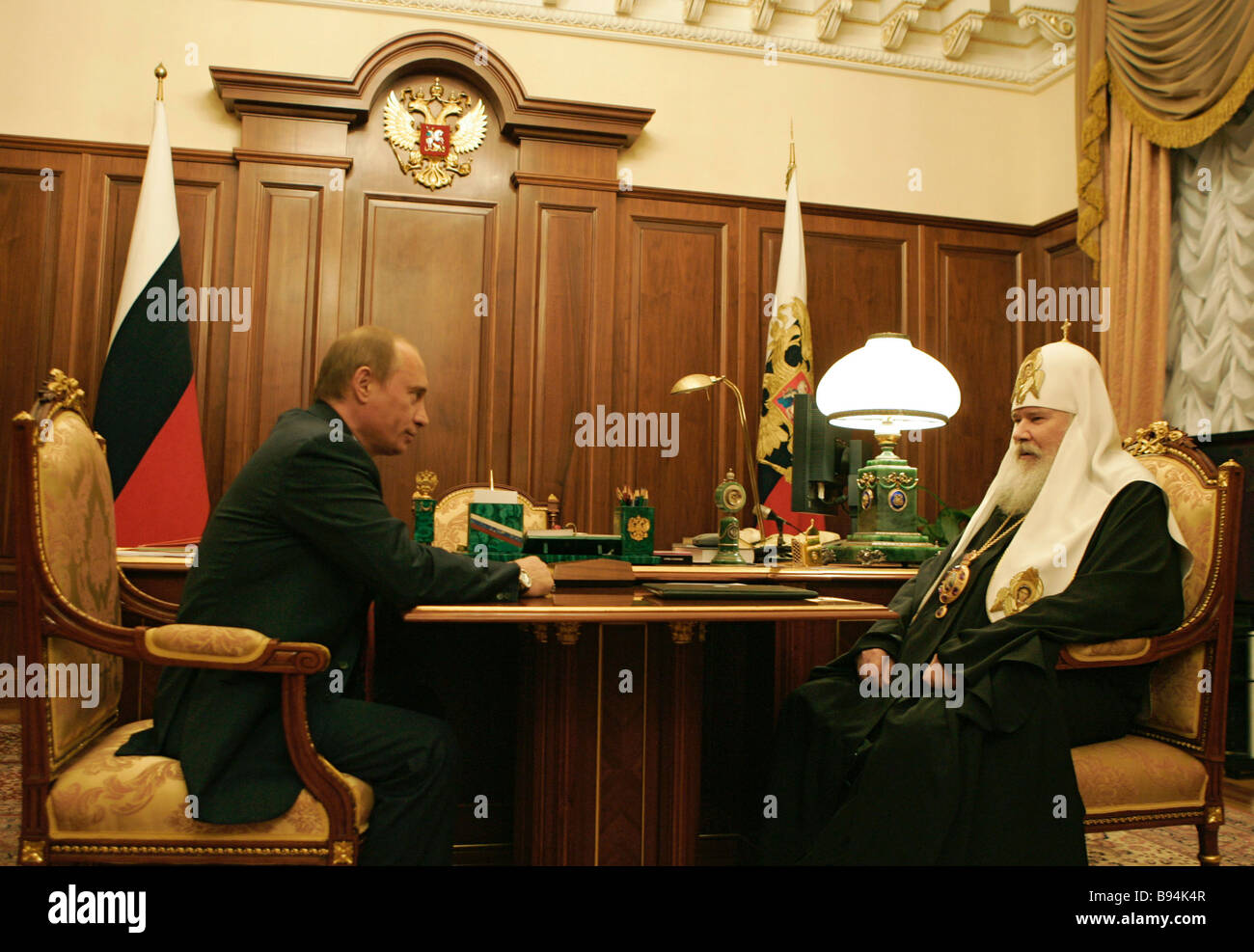 Russian President Vladimir Putin to the left meeting in his Kremlin ...