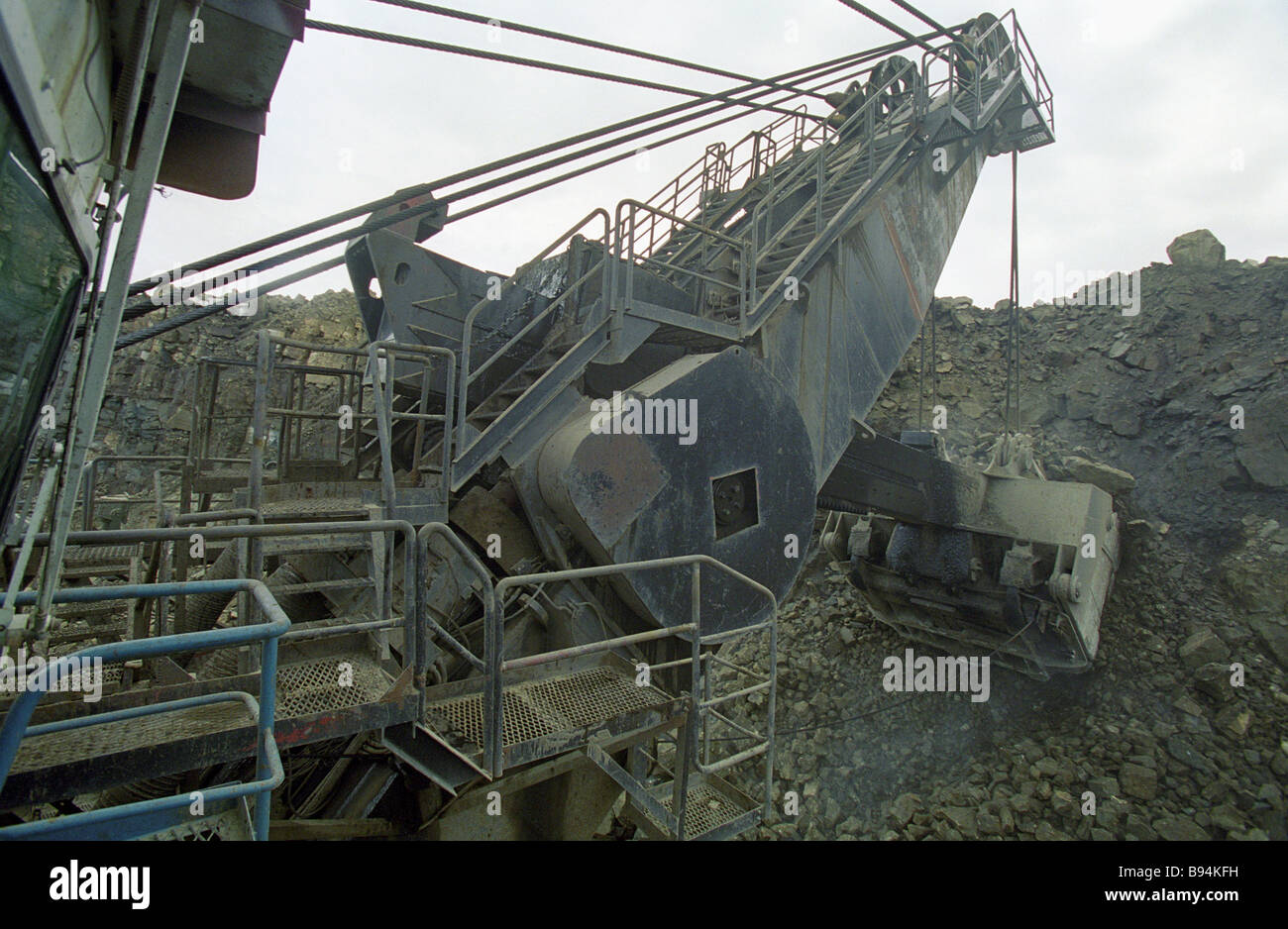 A digger developing a coal mine The Neryungri open pit coal mine Stock ...