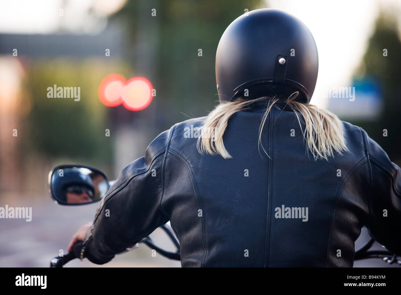 Back view of a biker Stock Photo - Alamy