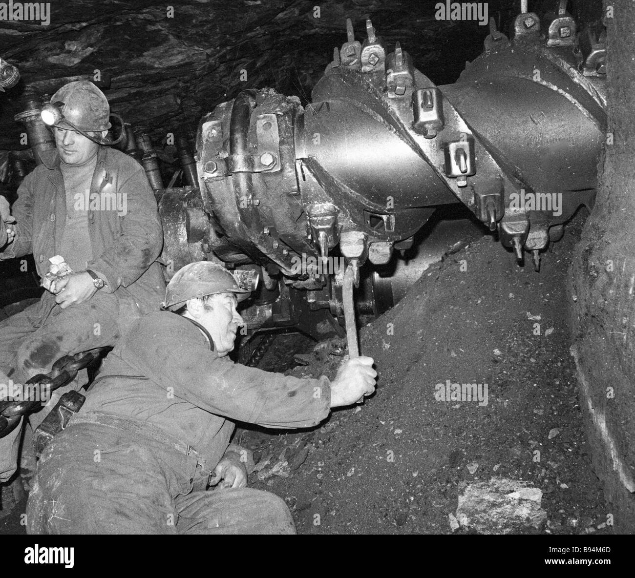 Miner Igor Selivanov fixes the cutter on the borax of a coal combine ...