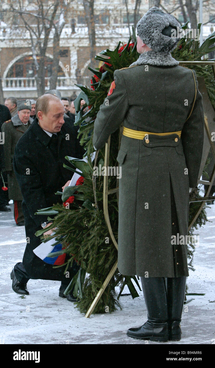 President Vladimir Putin laying a wreath to the Tomb of the Unknown ...