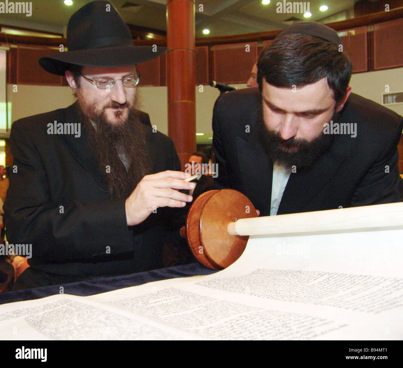 Russia s chief rabbi Berl Lazar left writing a Torah scroll at the ...
