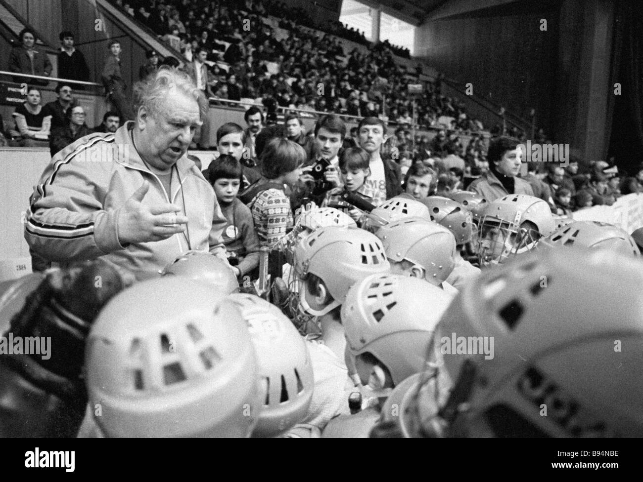 Honored Coach of the U S S R Anatoly Tarasov training young ice hockey ...