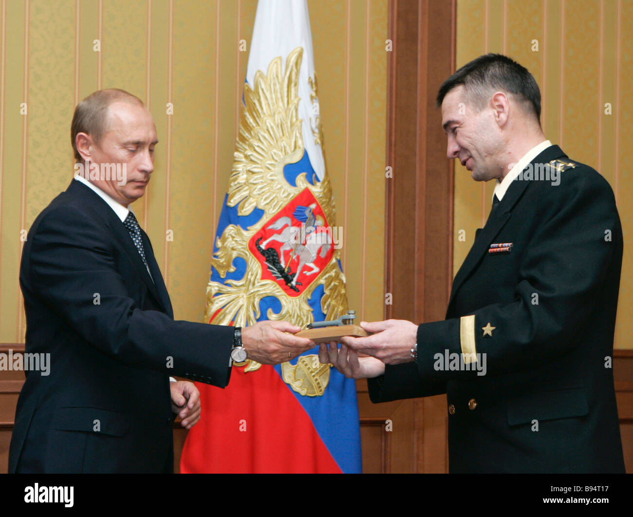 Russian President Vladimir Putin left meets Captain 1st Rank Sergei ...
