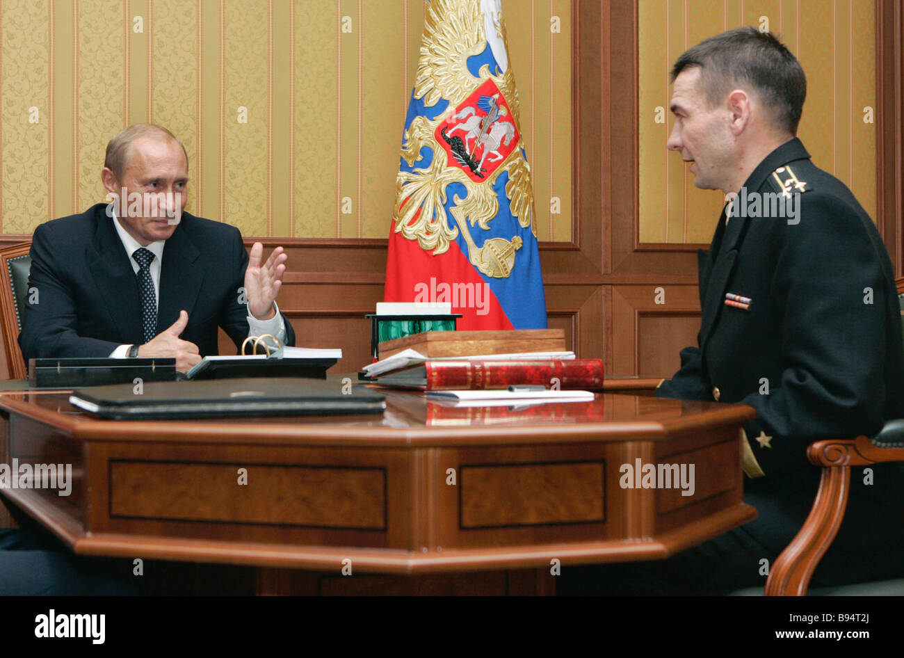 Russian President Vladimir Putin left meets Captain 1st Rank Sergei ...