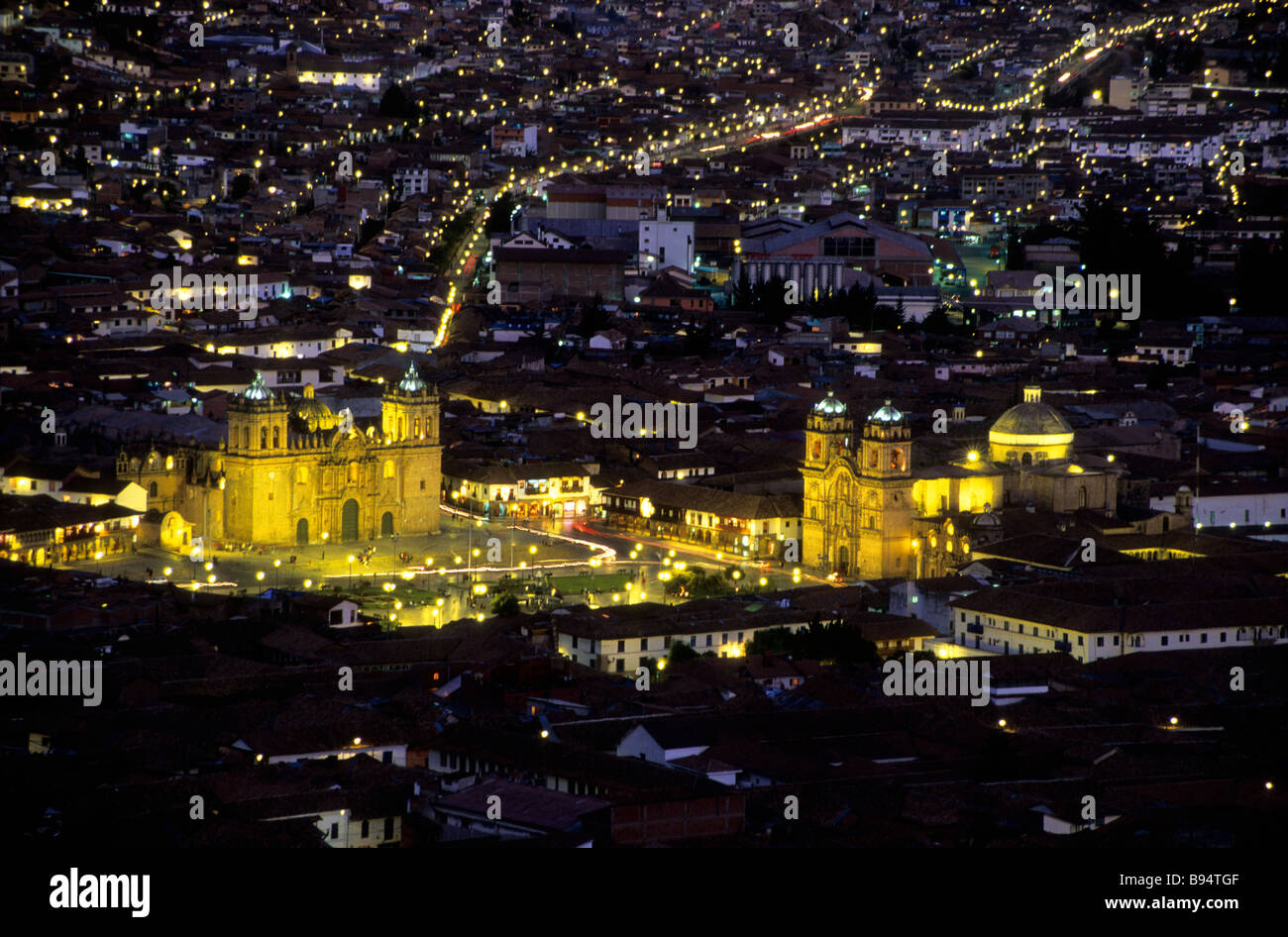 Aerial view of Plaza de Armas at night, Cusco, Peru. Cathedral on left ...