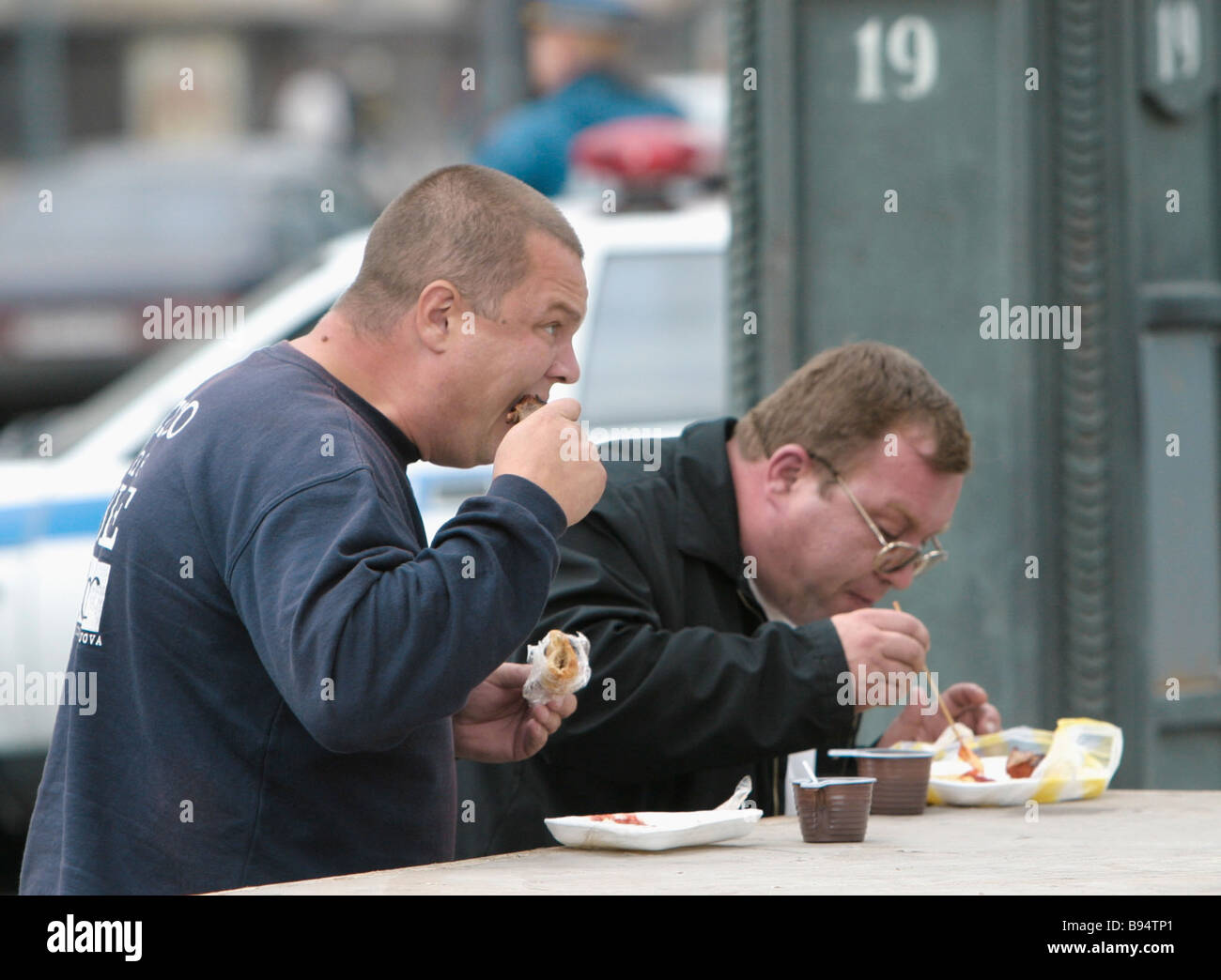 Taxi drivers having a dinner break Stock Photo - Alamy
