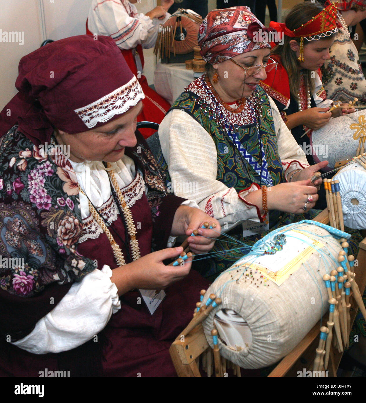 Lace makers from the Kizhi art center (Moscow) netting on bobbins at ...