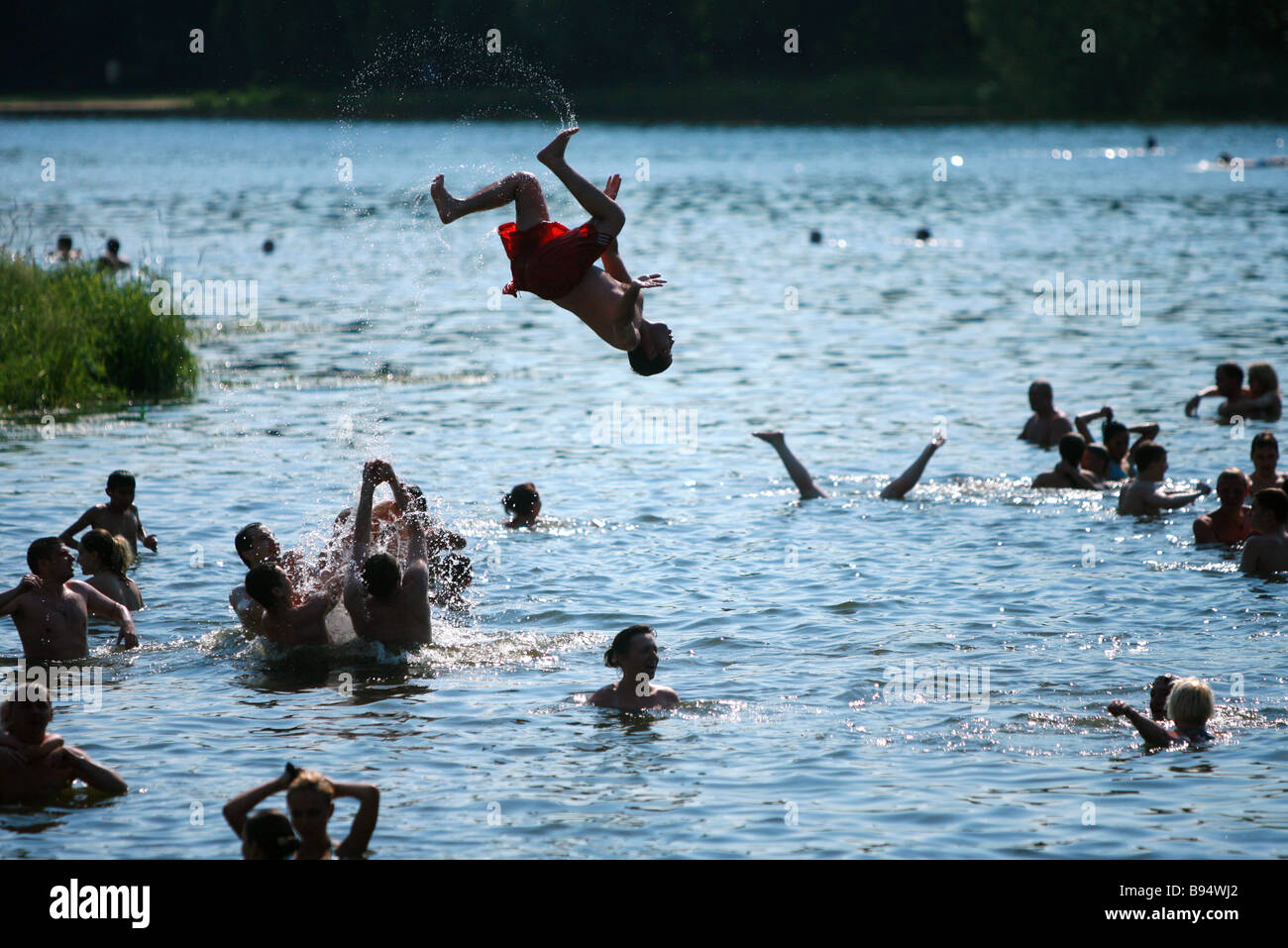 Stunt swimming in a lake near Moscow Stock Photo - Alamy