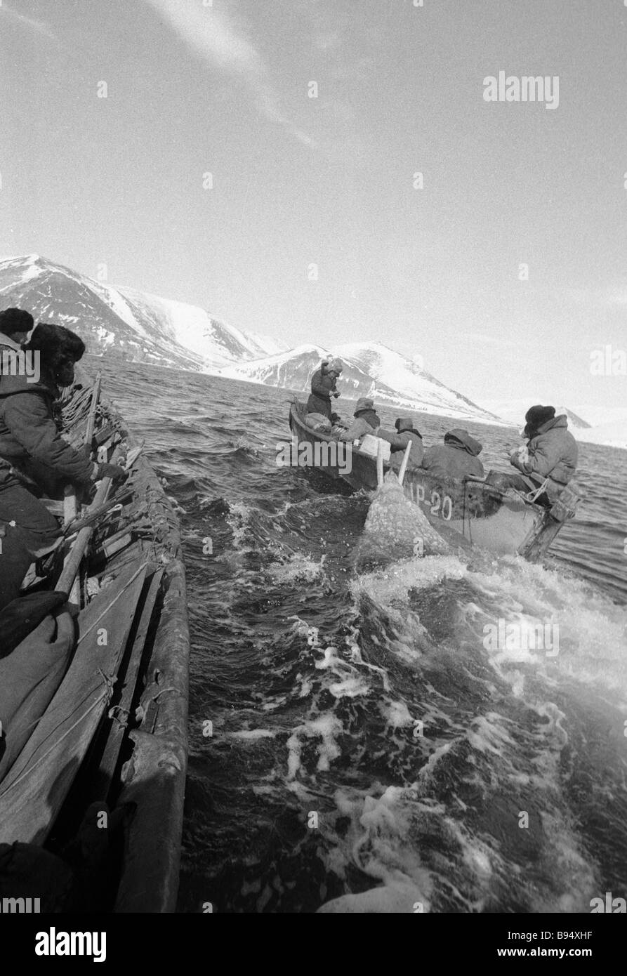 Eskimos hunters returning home Sireniki settlement Stock Photo - Alamy