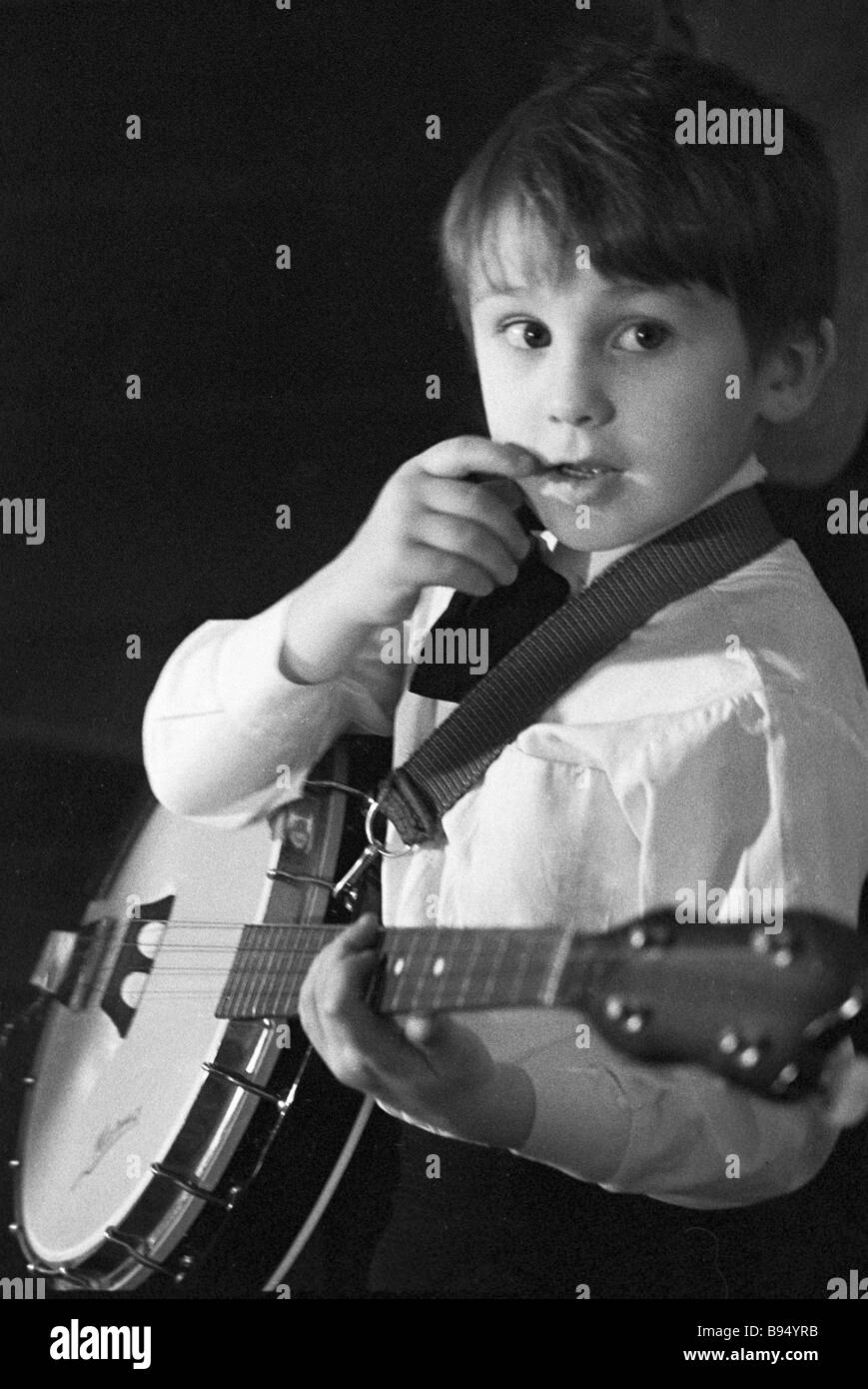 The youngest of the Ovechkin brothers plays a banjo Stock Photo - Alamy