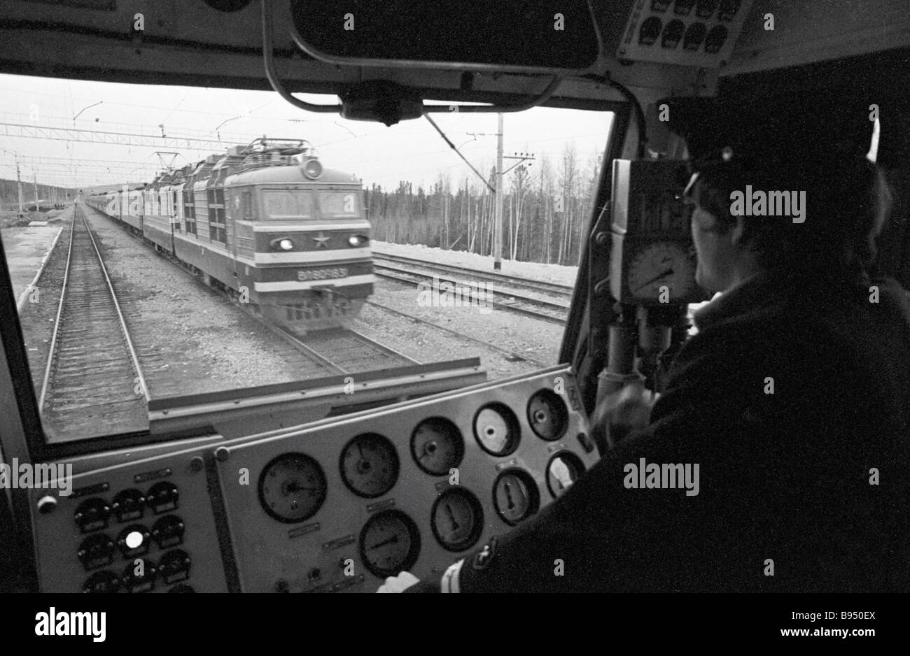 An engineer drives a freight train Stock Photo - Alamy