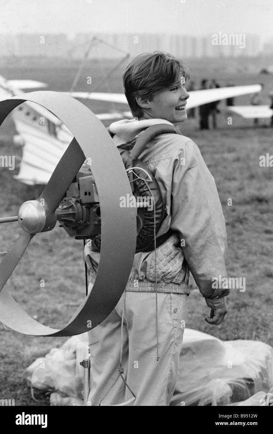 Participants in the contest of amateur aircraft designers demonstrating ...
