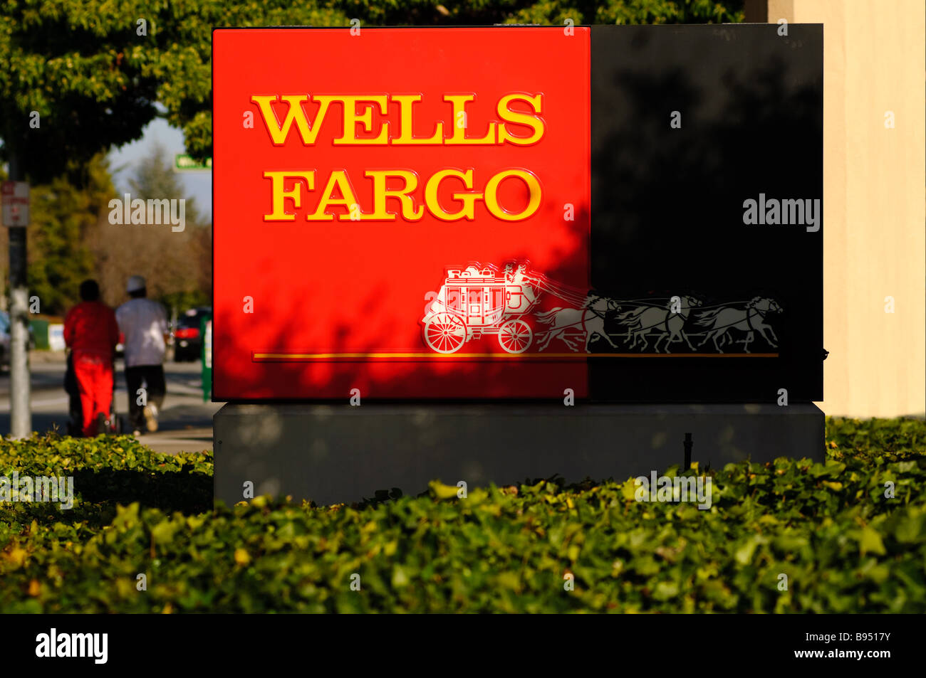 Wells Fargo Bank sign in suburban street Stock Photo - Alamy