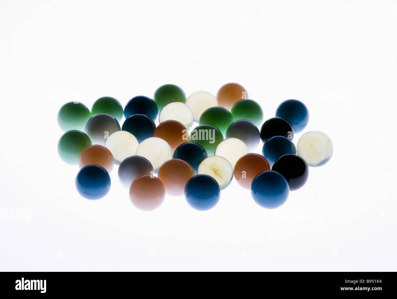 A group of marbles on a white background Stock Photo - Alamy