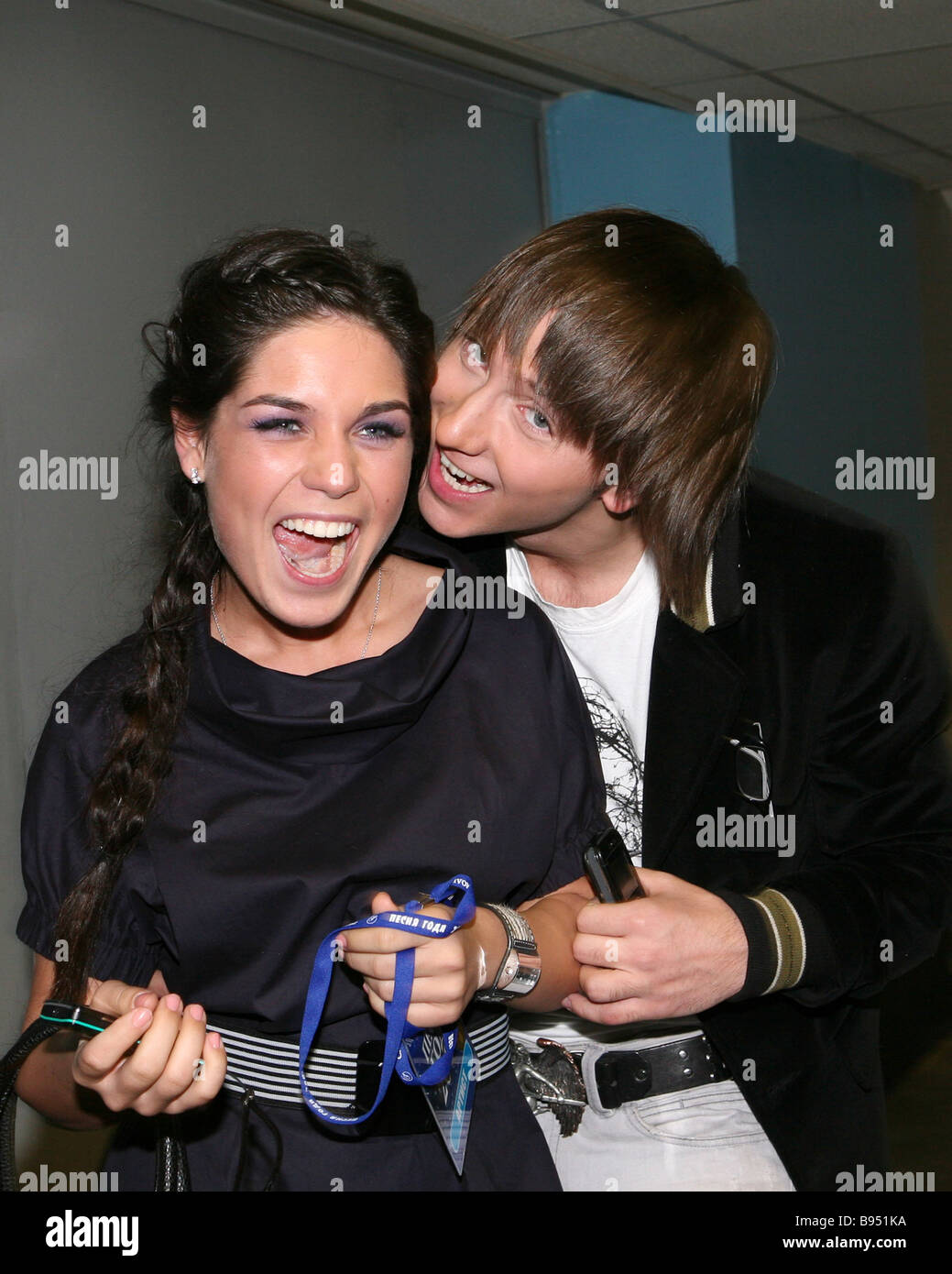Singer Mike Mironenko with his girlfriend at Olympiyski Stadium where ...