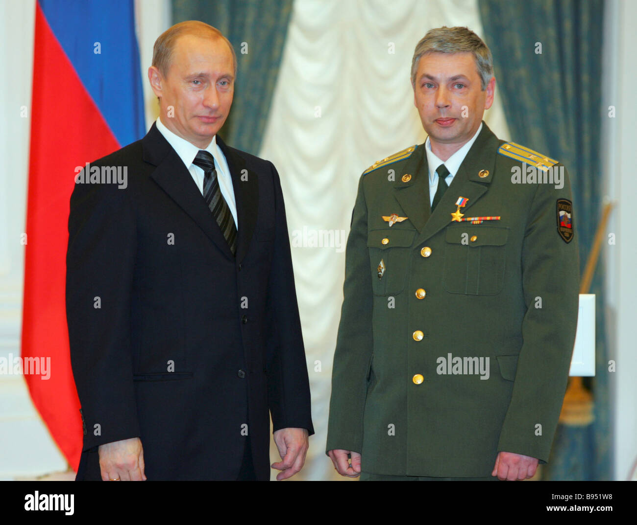 Russia s President Vladimir Putin left bestowing the Hero s Star on ...