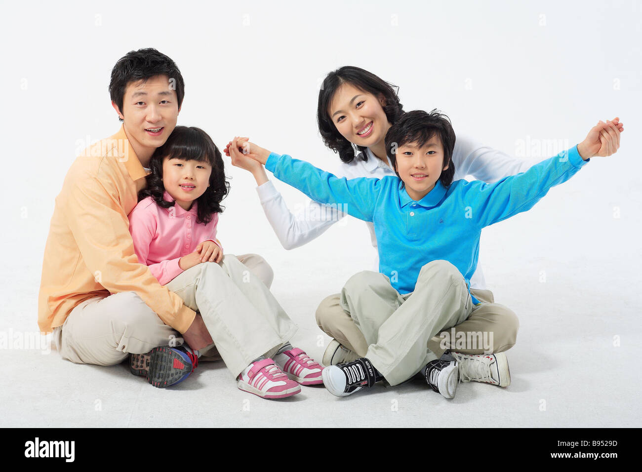 Happy Asian Family Stock Photo - Alamy
