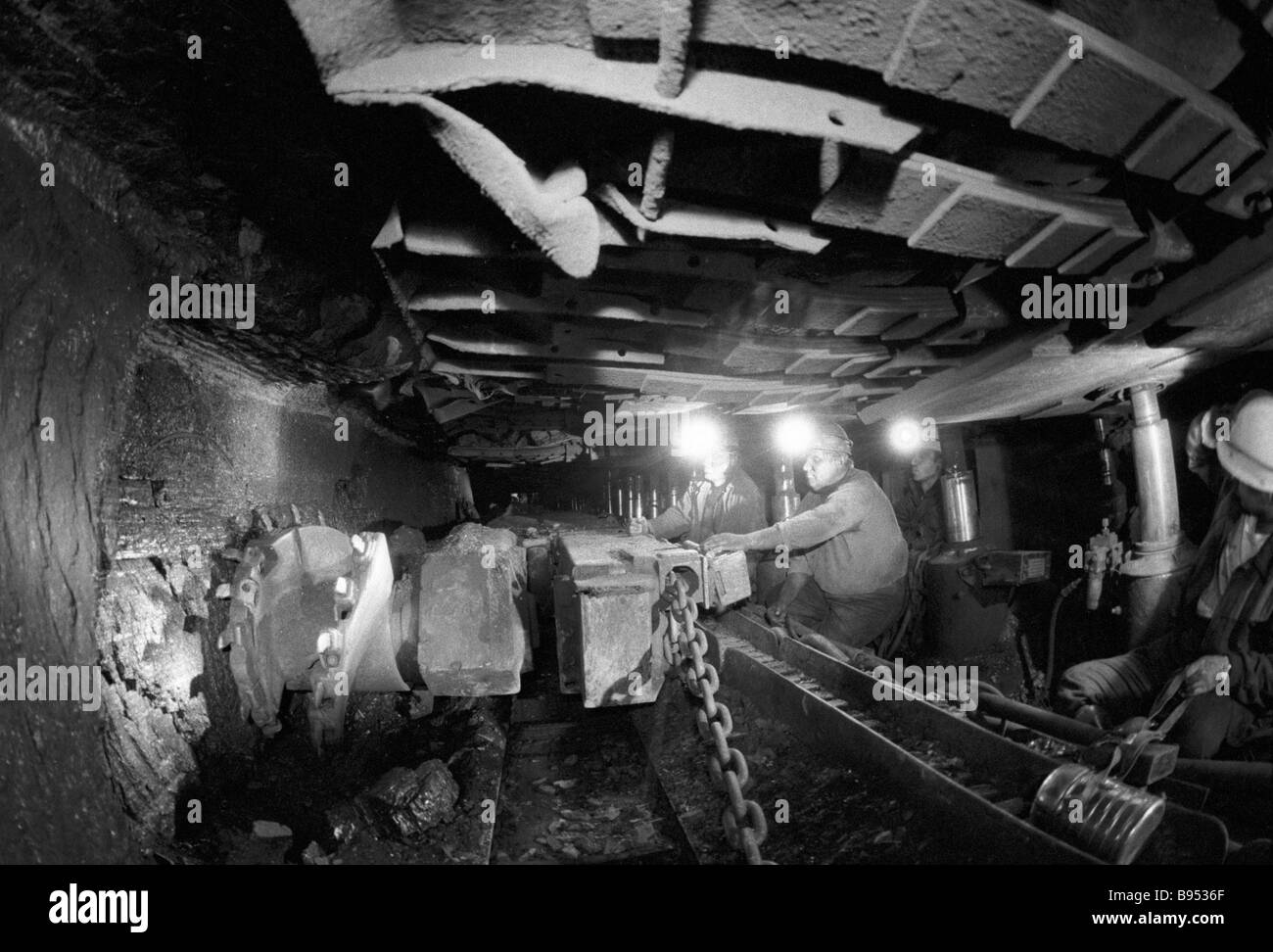 A coal miner works in the mine face Stock Photo: 22854567 - Alamy