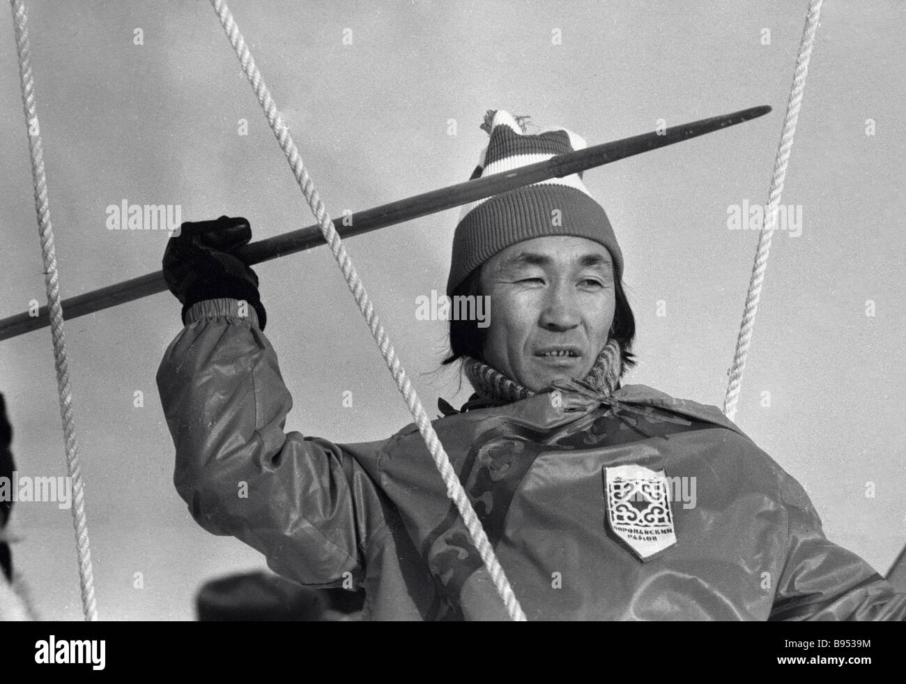 A Nivkh throwing a harpoon A national carnival in the village of ...