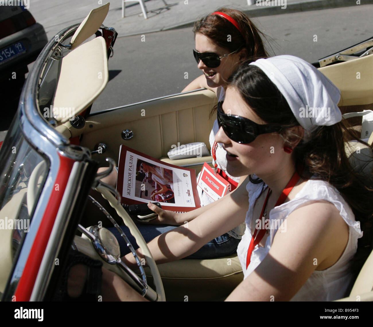 Participants in the women s second rally of classic cars in Moscow ...