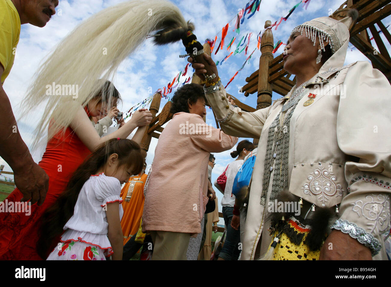 Meeting the engaged couple at a Yakut wedding ceremony Stock Photo - Alamy